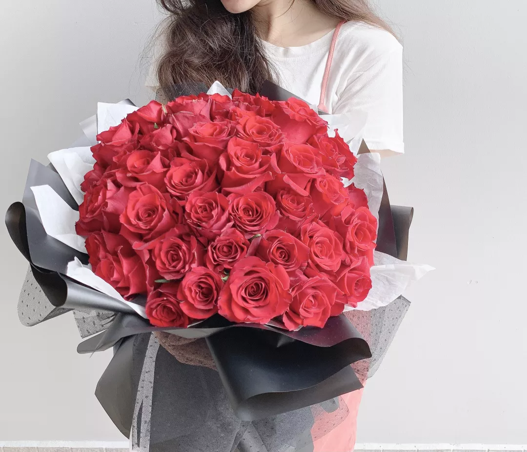 52 Premium Red Roses - Flories & Co's Flower on thefloristmarket.com
